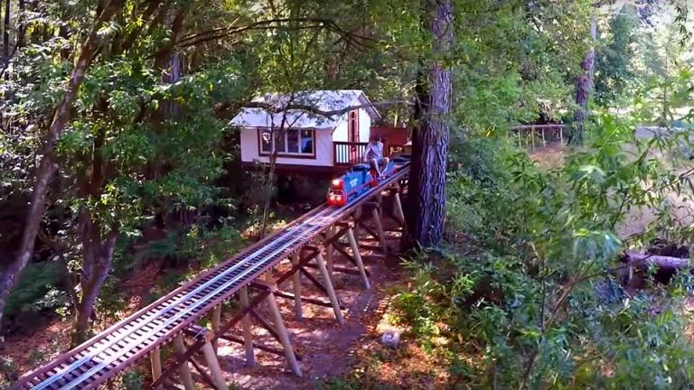Scale Train Moving On Backyard Railway Trestle Is Simply Mesmerizing