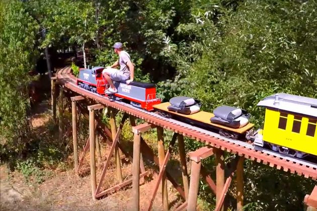 Scale Train Moving On Backyard Railway Trestle Is Simply Mesmerizing